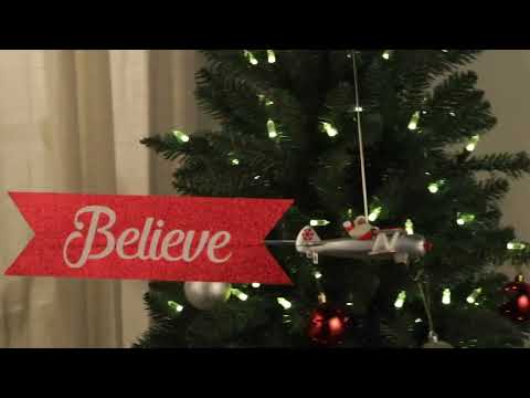 Animated Biplane Tree Topper with Banner - Black Santa – Mr. Christmas